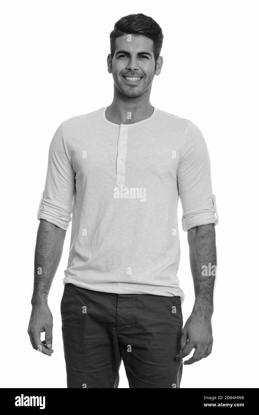 Portrait of happy young handsome Persian man smiling Stock Photo - Alamy