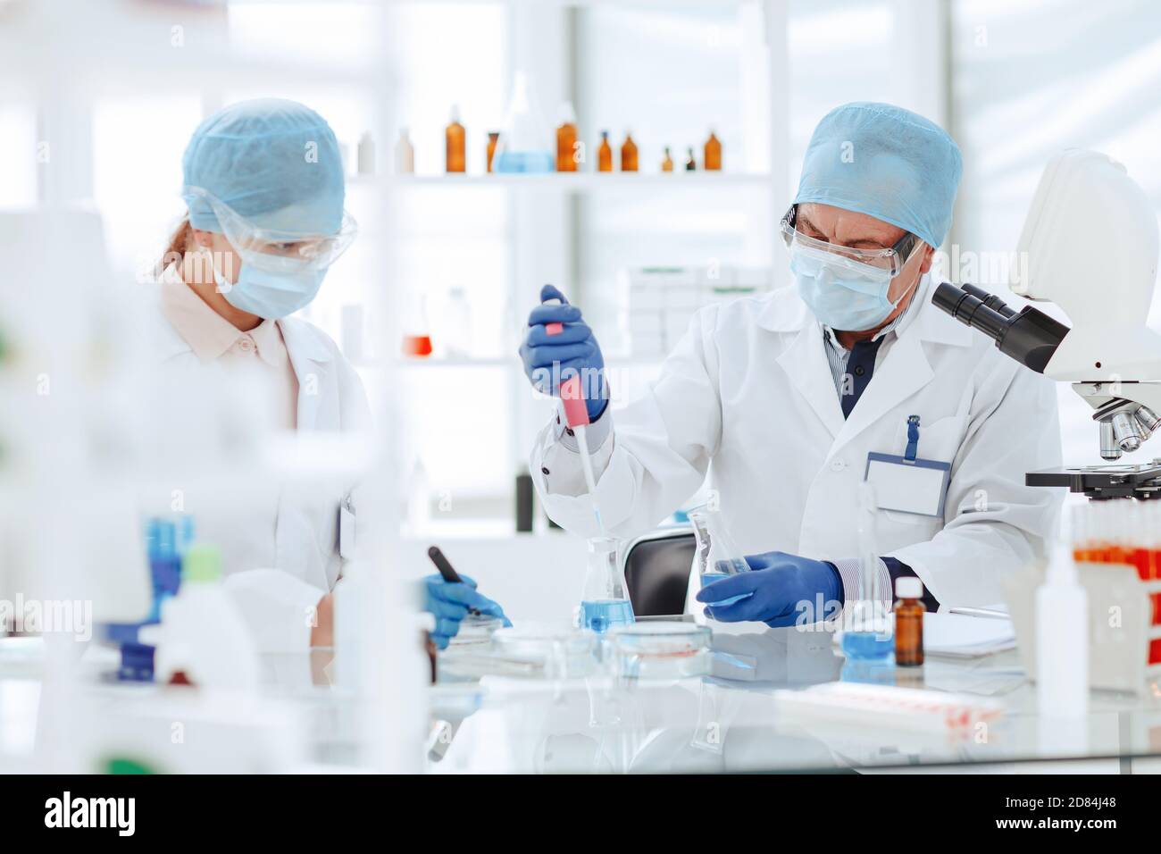 Microbiology scientists are working on creating a new vaccine Stock ...