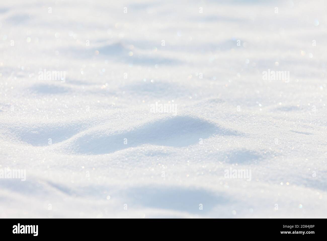 Sunny snow background with shades Stock Photo - Alamy