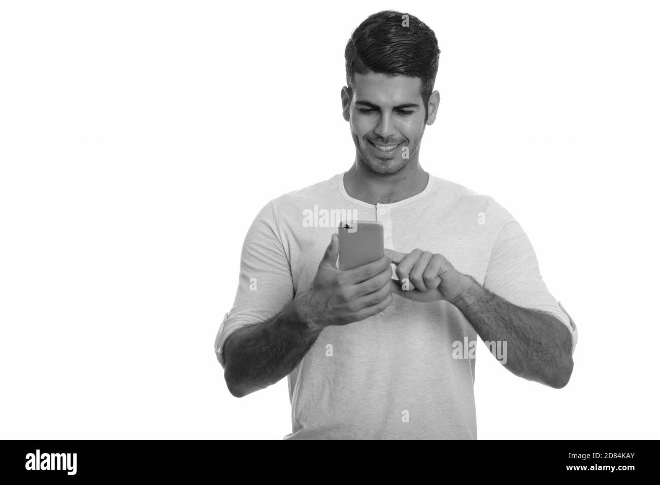 Handsome smiling man using Black and White Stock Photos & Images - Alamy