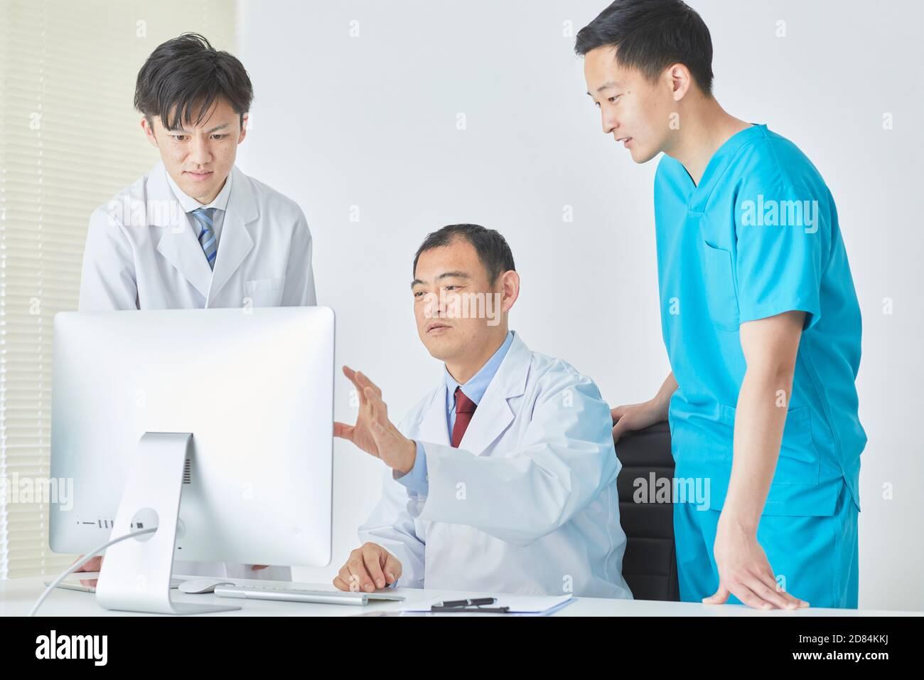 Japanese doctors in the studio Stock Photo - Alamy