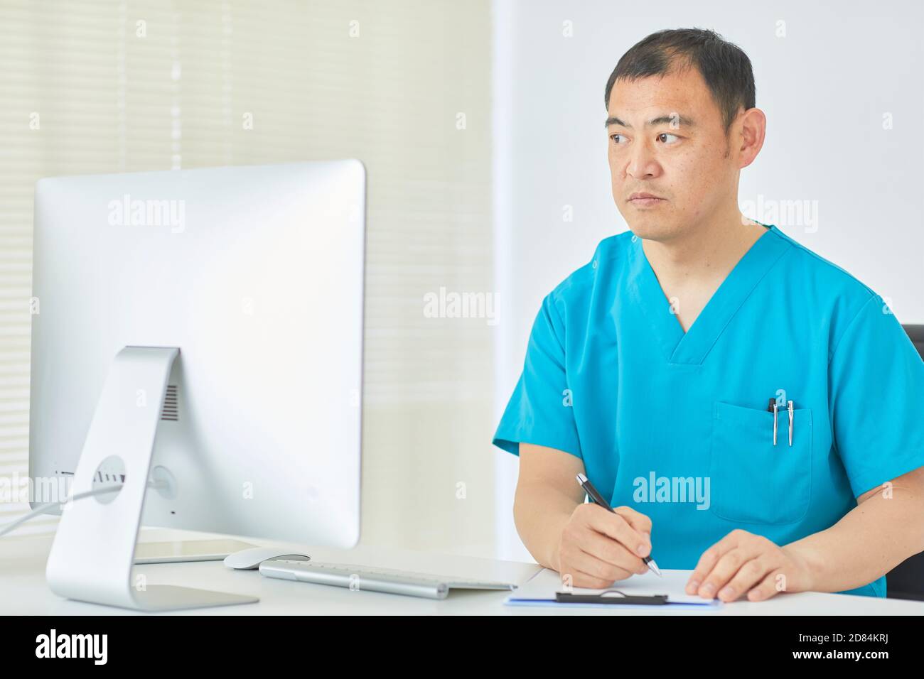 Japanese doctor in the studio Stock Photo - Alamy