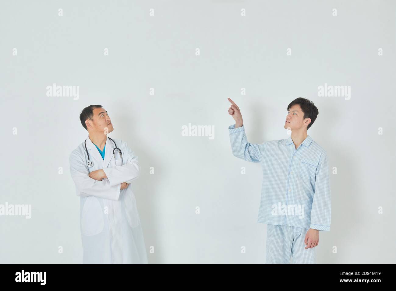 Japanese doctor and patient Stock Photo - Alamy