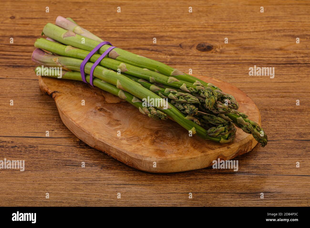 Vegan cuisine - Raw asparagus heap for cooking Stock Photo - Alamy