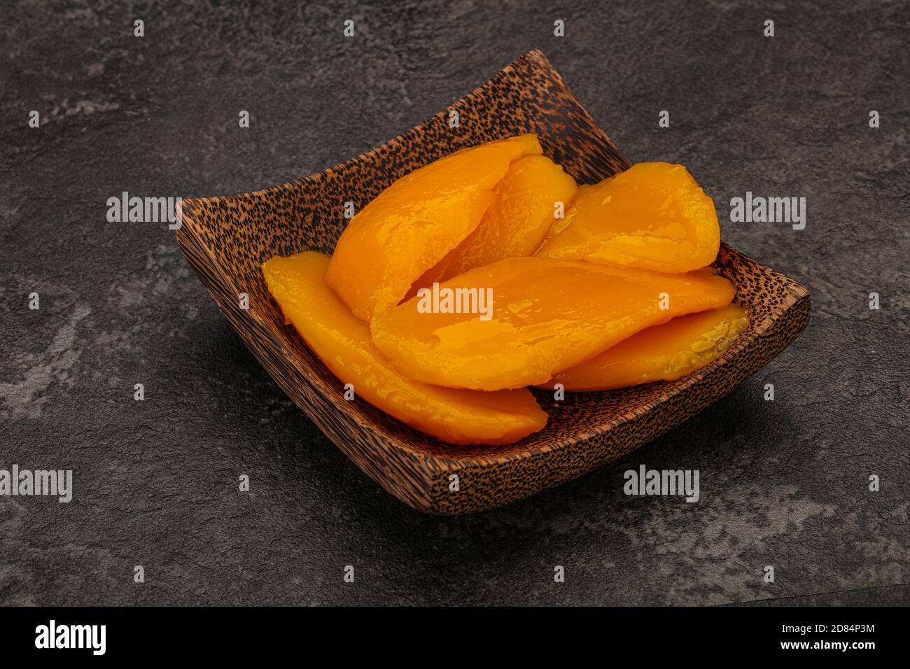 Sweet delicous mango slices in syrop Stock Photo - Alamy