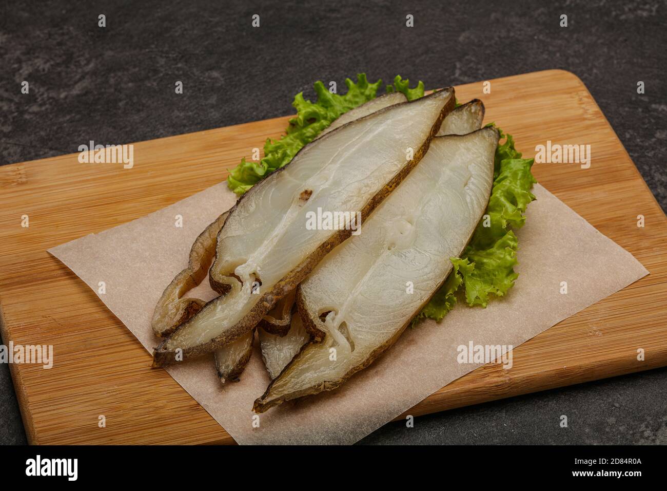 Delicous smoked halibut fish slices snack Stock Photo - Alamy