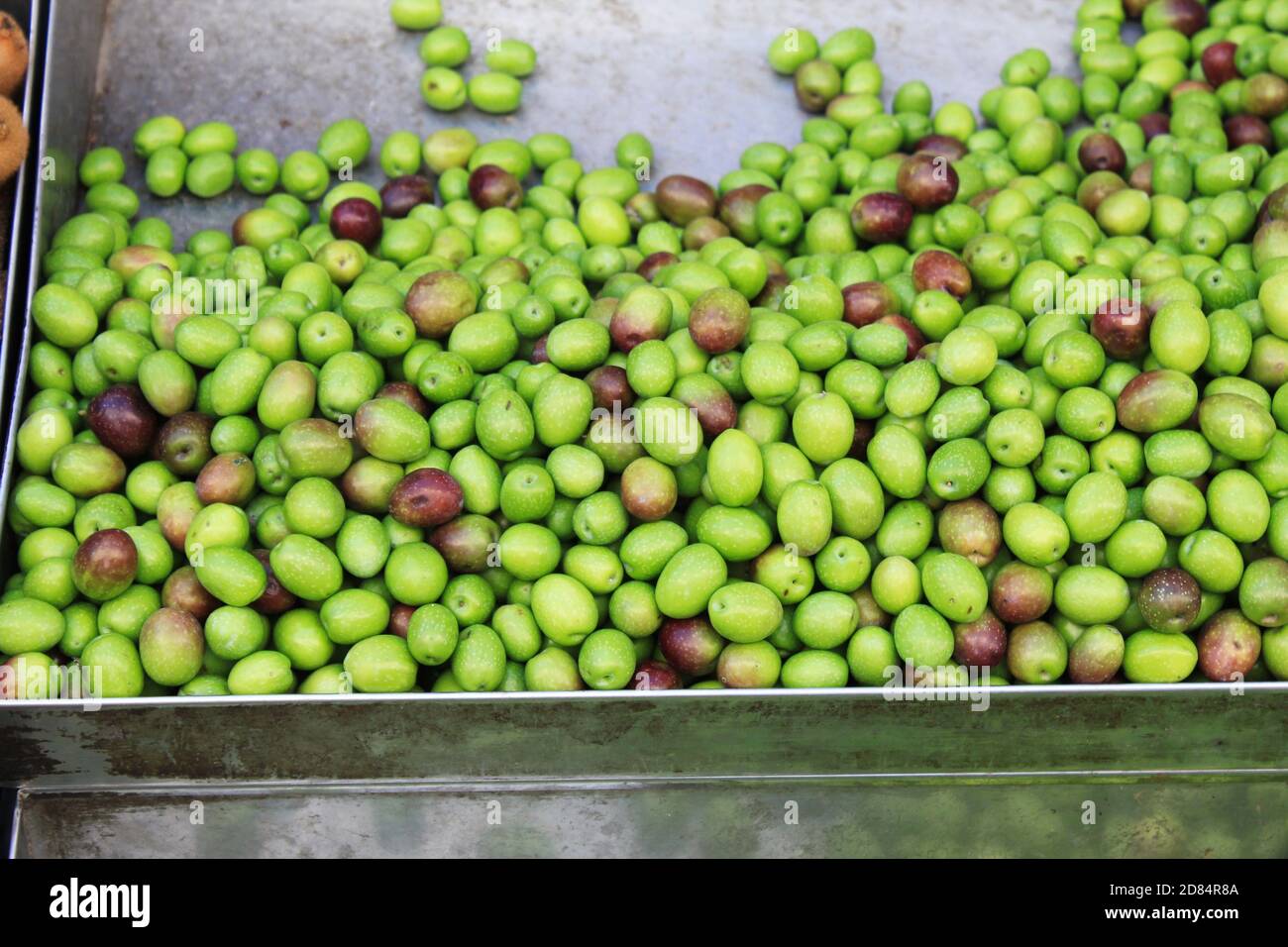 Stall with green olives at street market in Athens, Greece Stock Photo ...