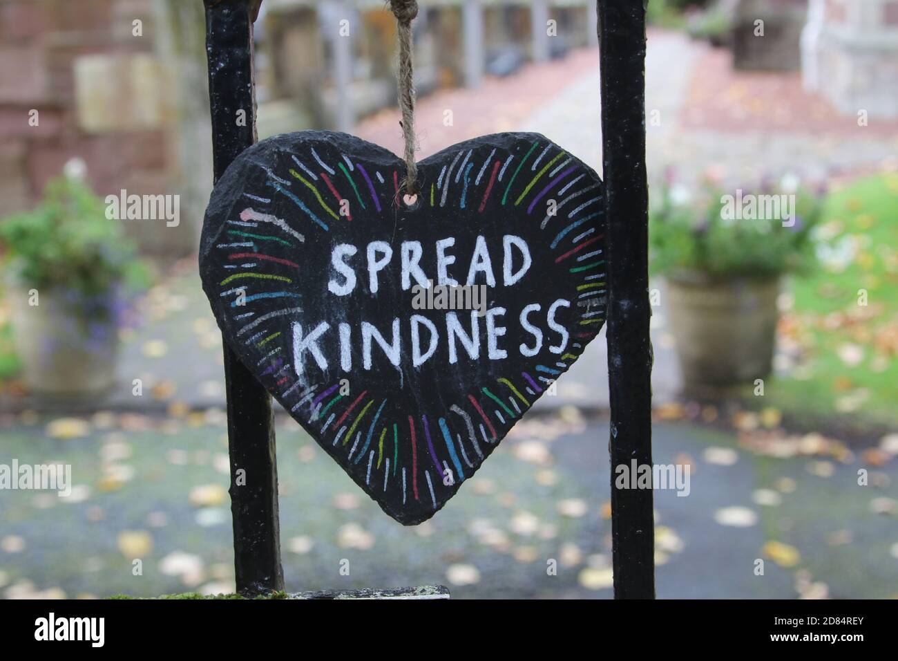 Spread Kindness, heart shapped notice painted onto slate, hanging from ...