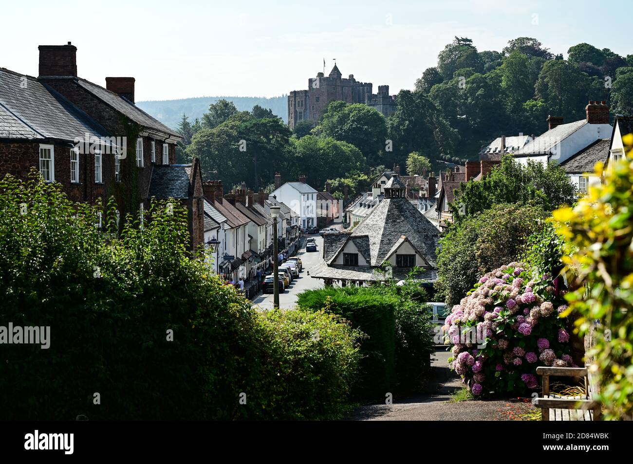 A view down the historic High Street, in the town of Dunster, Somerset ...