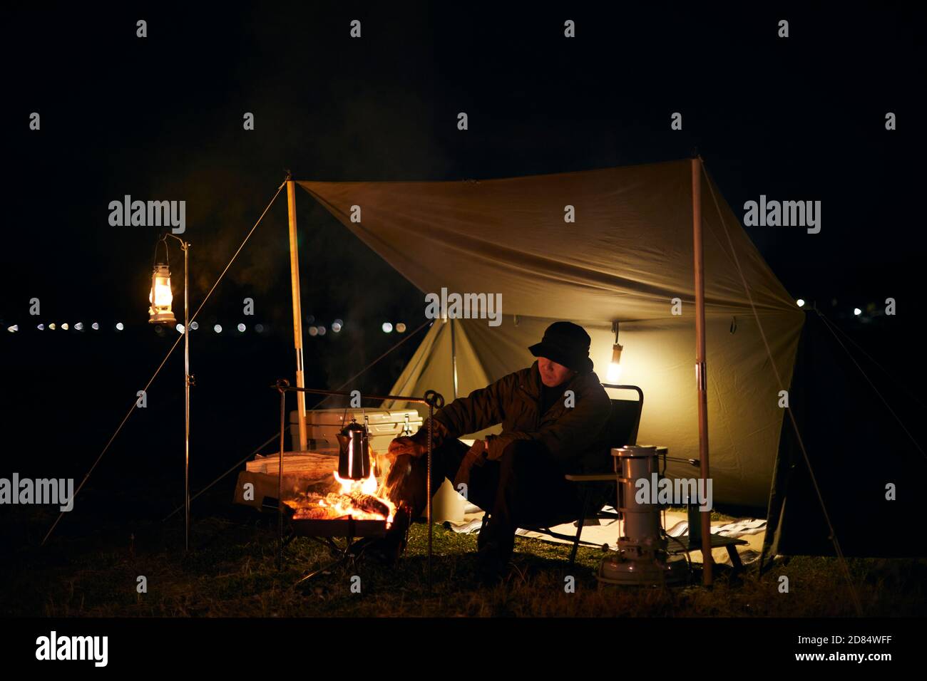 Japanese man solo camping Stock Photo - Alamy