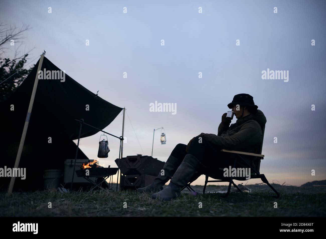 Japanese man solo camping Stock Photo - Alamy