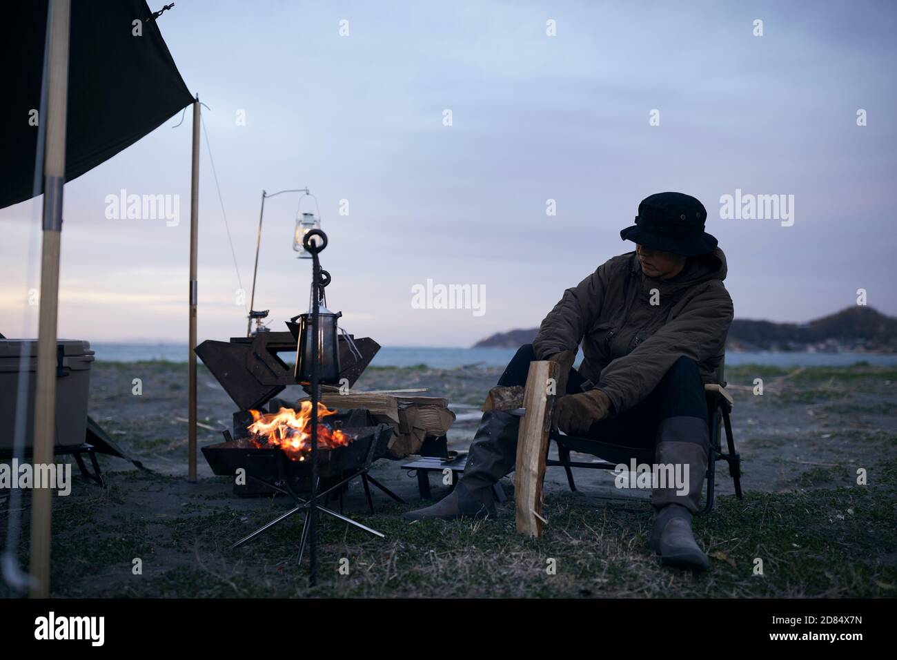 Japanese man solo camping Stock Photo - Alamy
