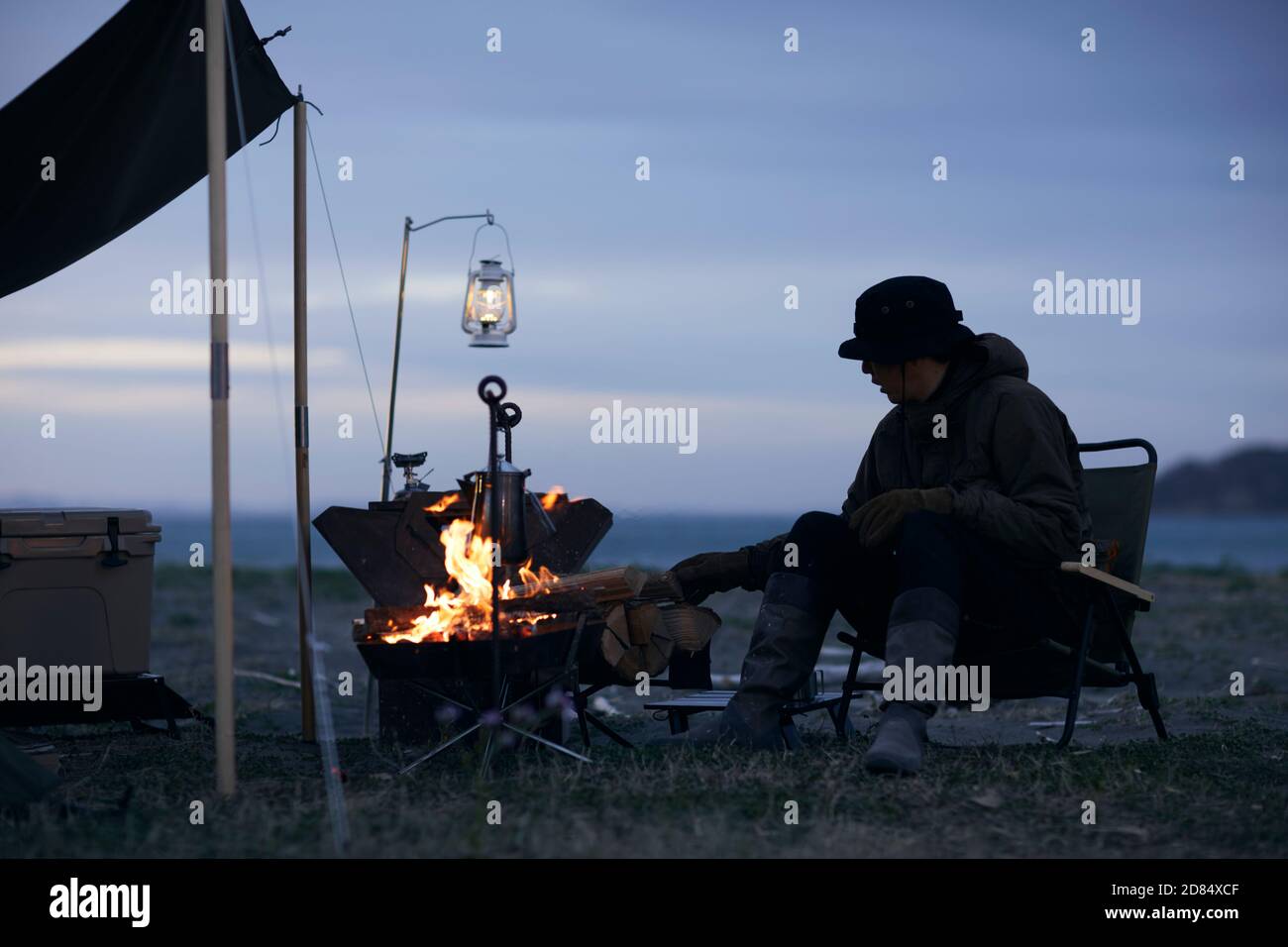 Japanese man solo camping Stock Photo - Alamy