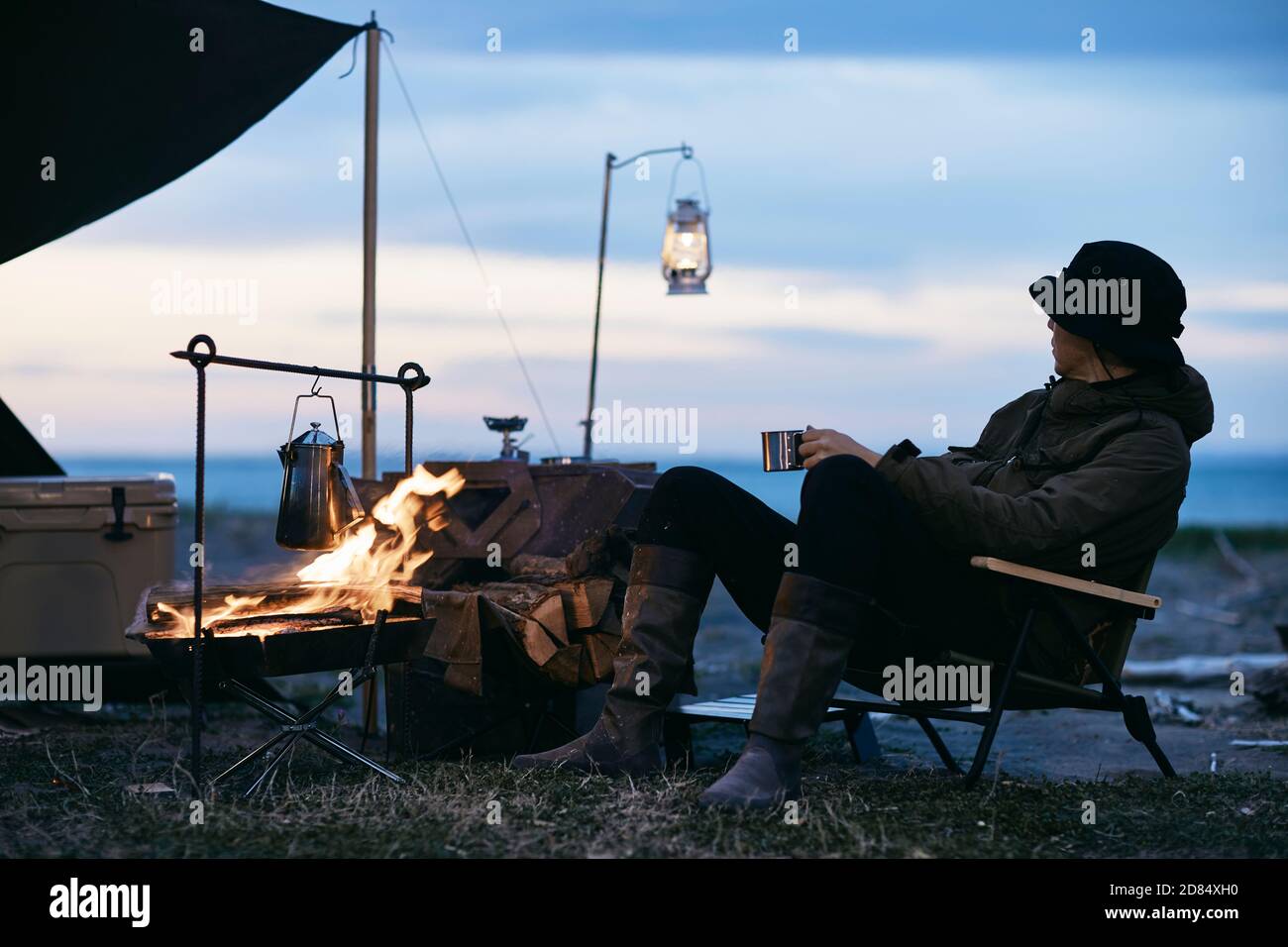 Japanese man solo camping Stock Photo - Alamy
