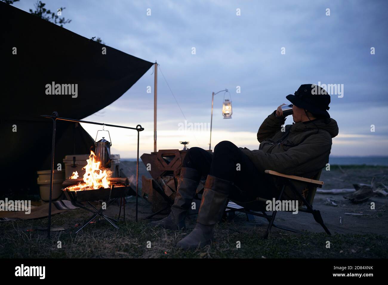 Japanese man solo camping Stock Photo - Alamy