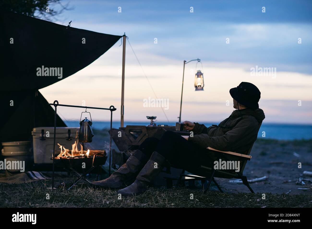 Japanese man solo camping Stock Photo - Alamy
