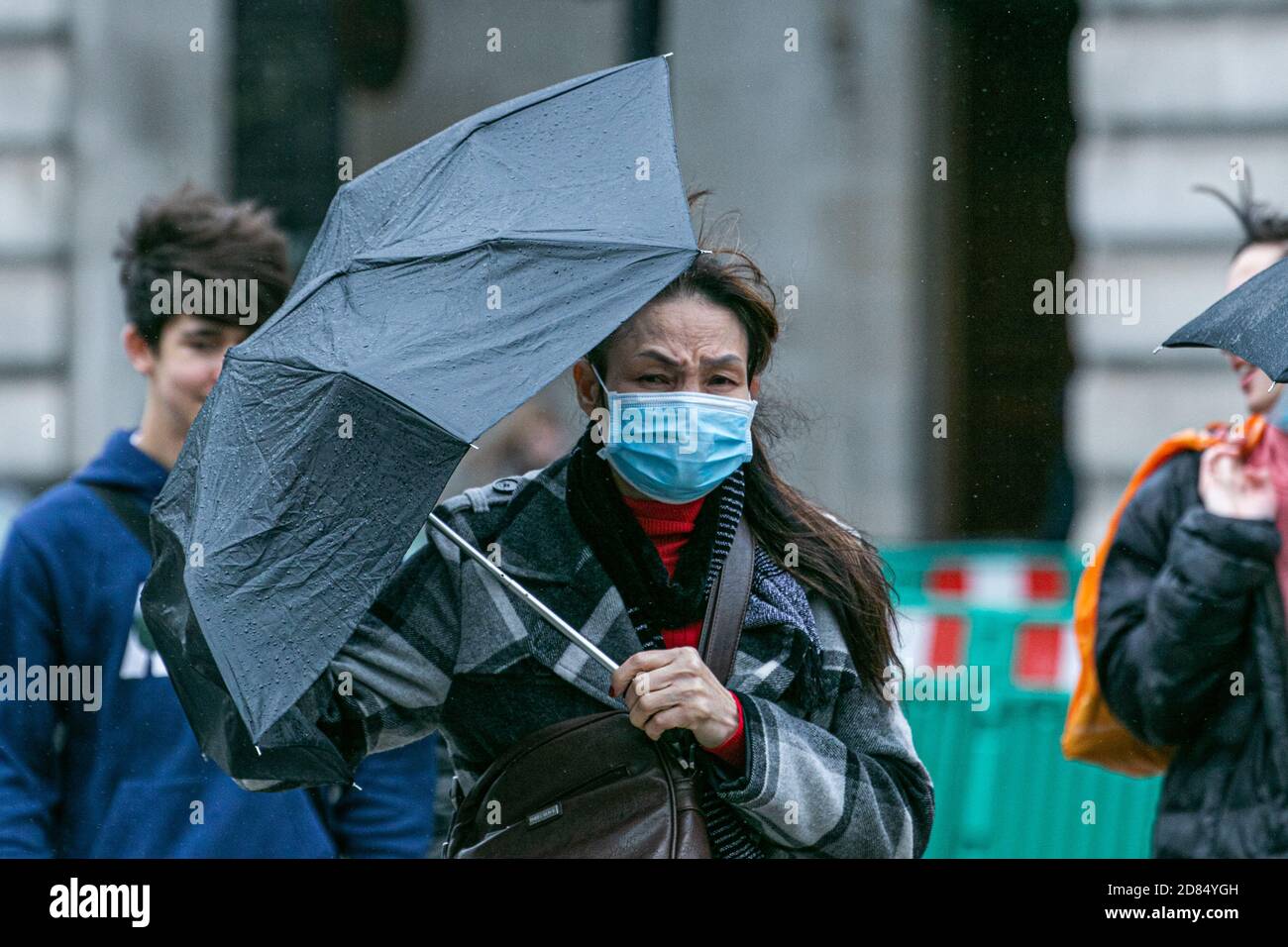 LONDON,UK 27 October 2020. A woman pedestrian in Piccadilly ...