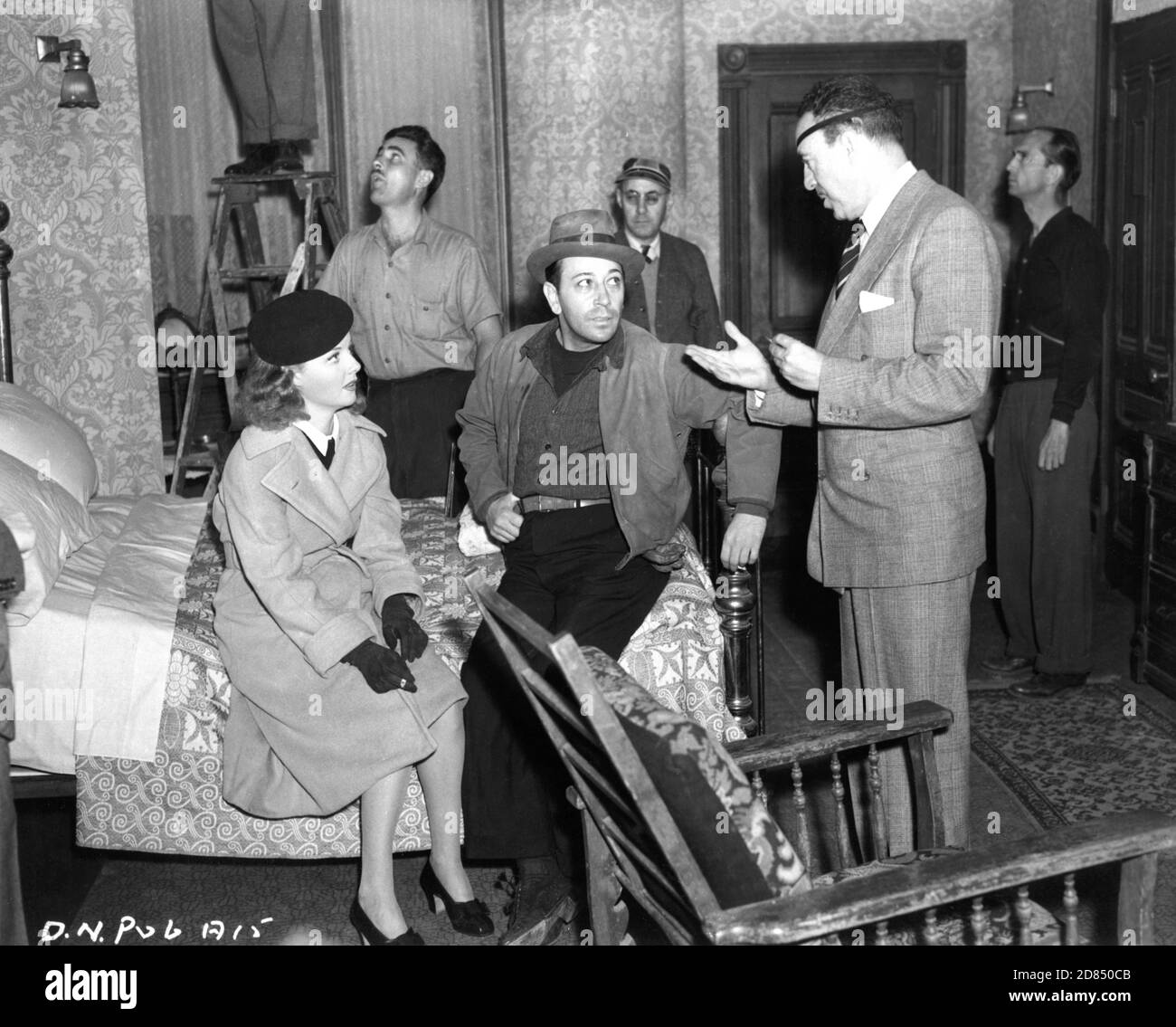 Ann Sheridan George Raft And Raoul Walsh On Set Candid With Movie Crew
