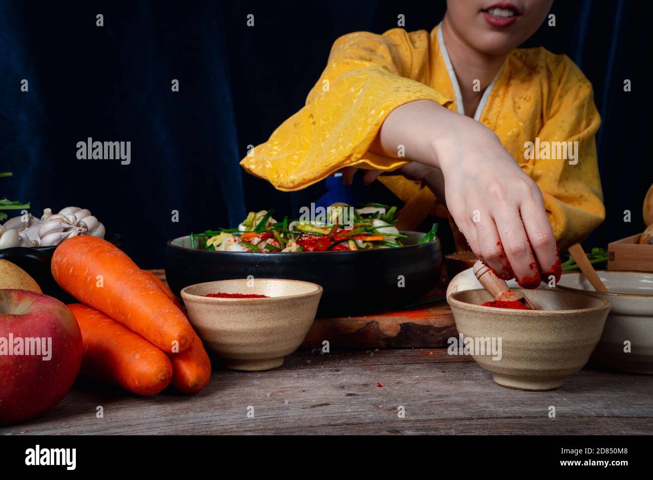 Asian women wearing Korean traditional costumes (hanbok) are mixing ...