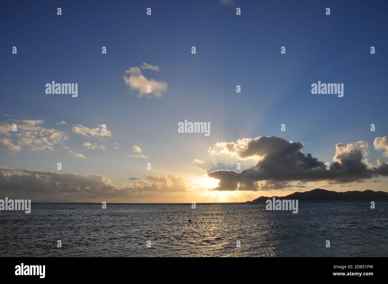 Dramatic sky with clouds and sunbeam over the Indian Ocean Stock Photo ...