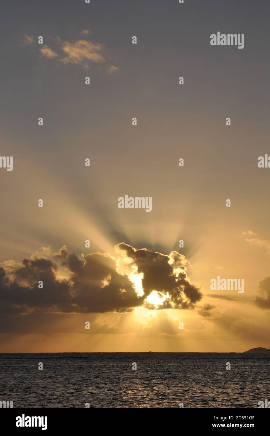 Dramatic sky with clouds and sunbeam over the Indian Ocean Stock Photo ...