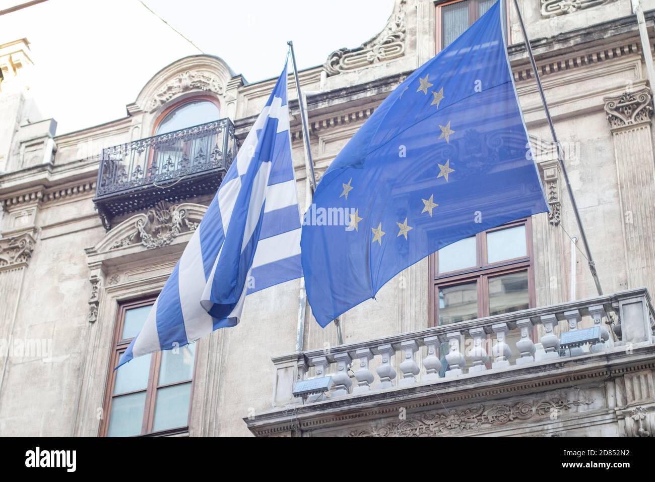 Greek Embassy in Turkey. The flag of the European Union and Greece on ...