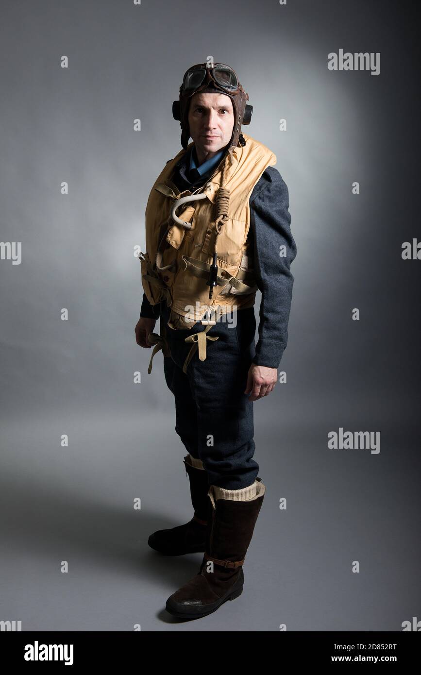 World War Two, RAF fighter pilot / bomber crew member, standing against ...