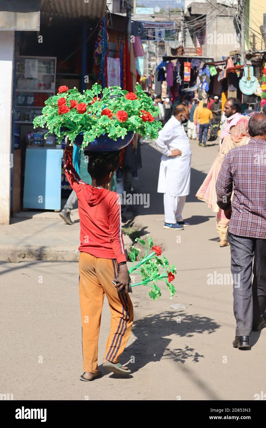 October 27, 2020, Poonch, Jammu and Kashmir, India: A child sells ...
