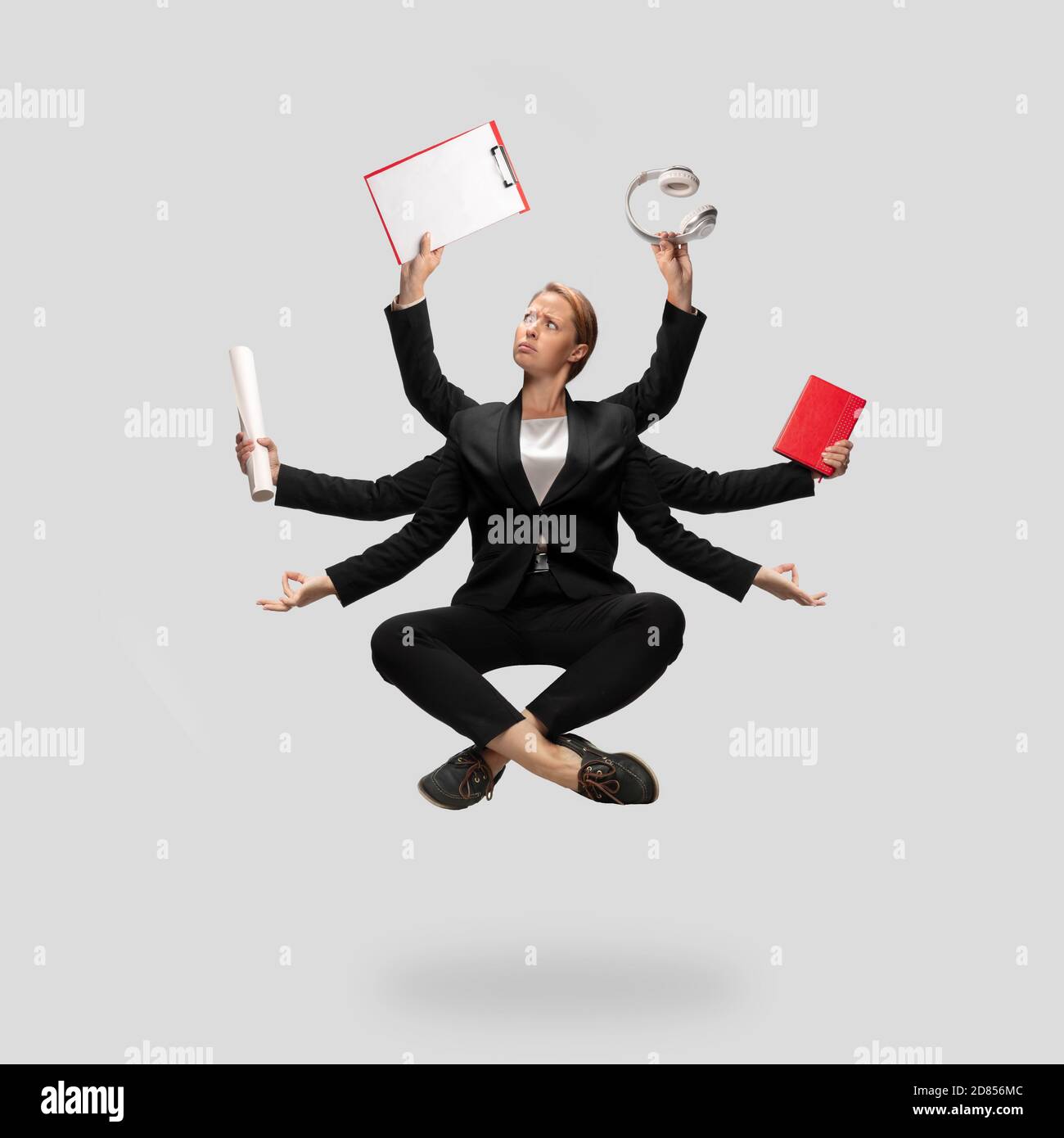 Beautiful business woman, secretary, multi-armed manager levitating ...