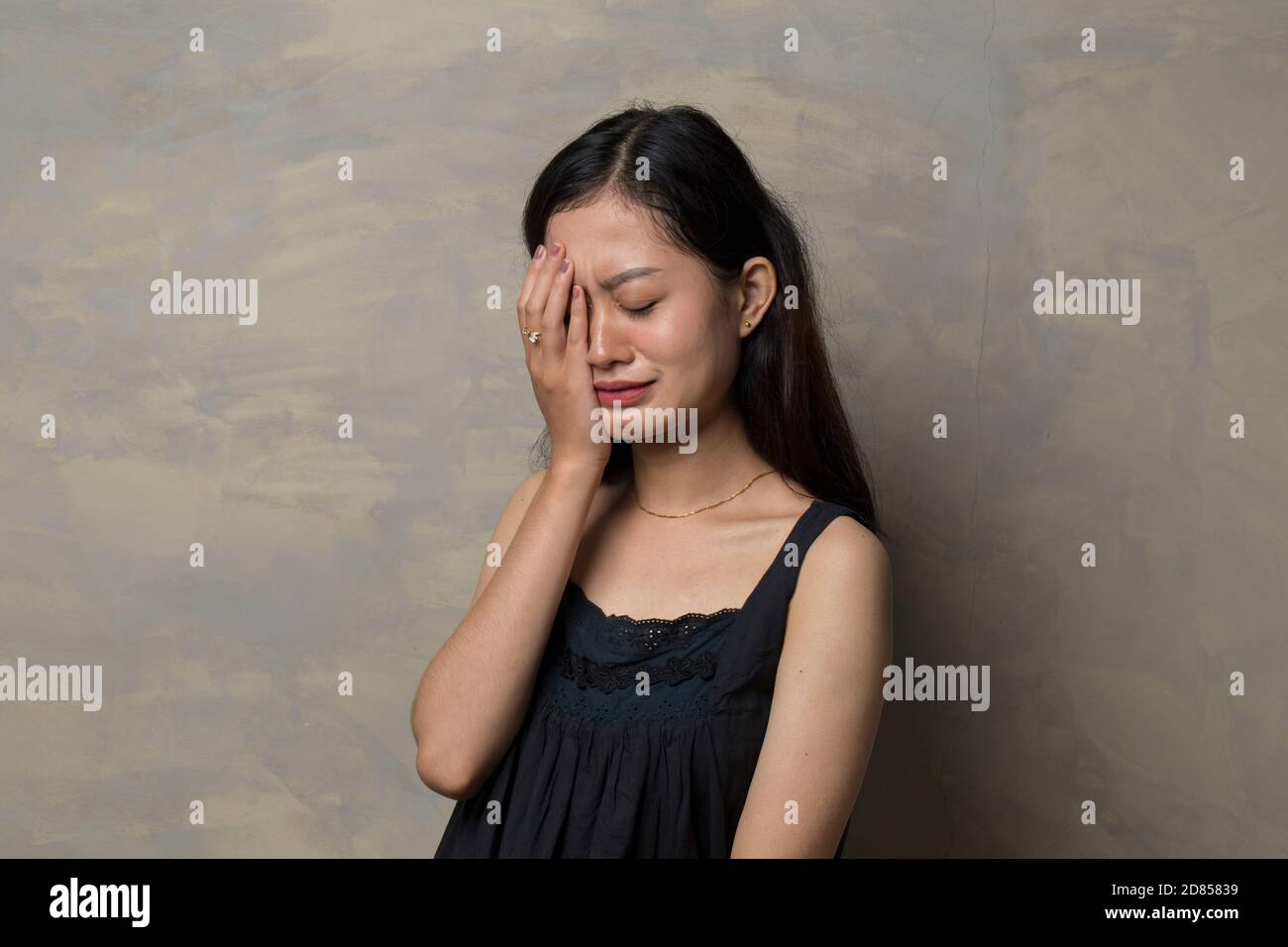 Southeast asian woman sad hi-res stock photography and images - Alamy