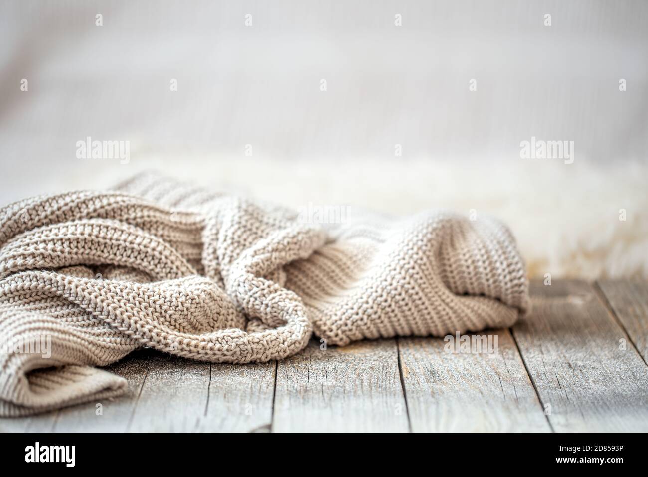 Background with a cozy knitted sweater, space for text. Minimalism ...