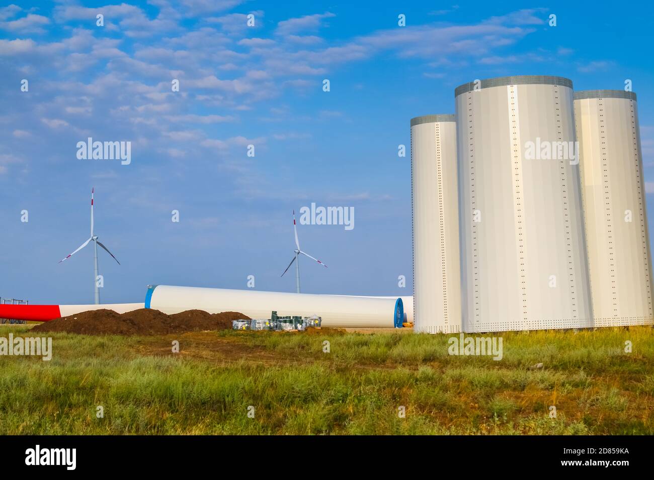 Windmill construction. Installation of a wind turbine. Blue sky Stock ...