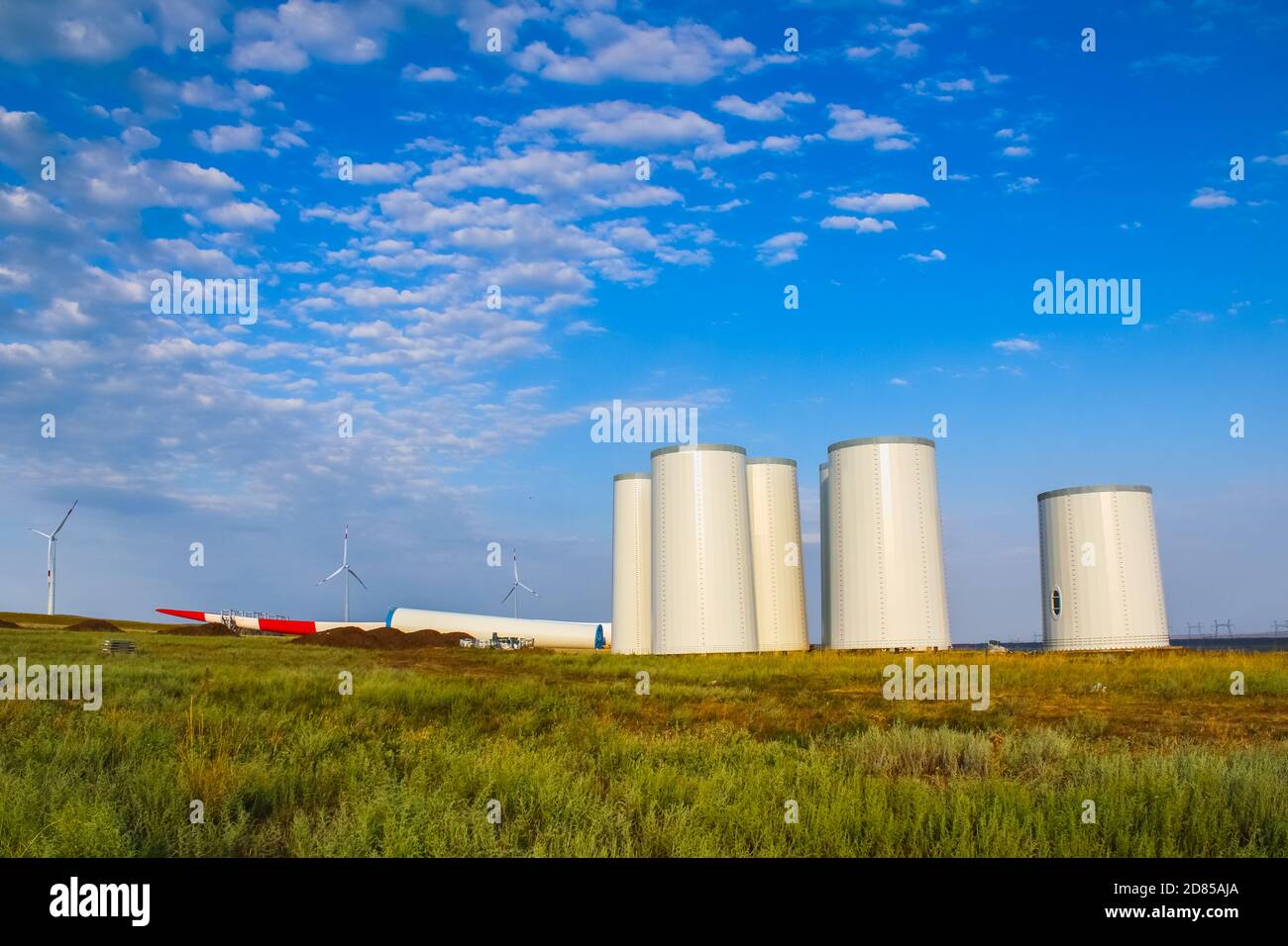 Windmill construction. Installation of a wind turbine. Blue sky Stock ...