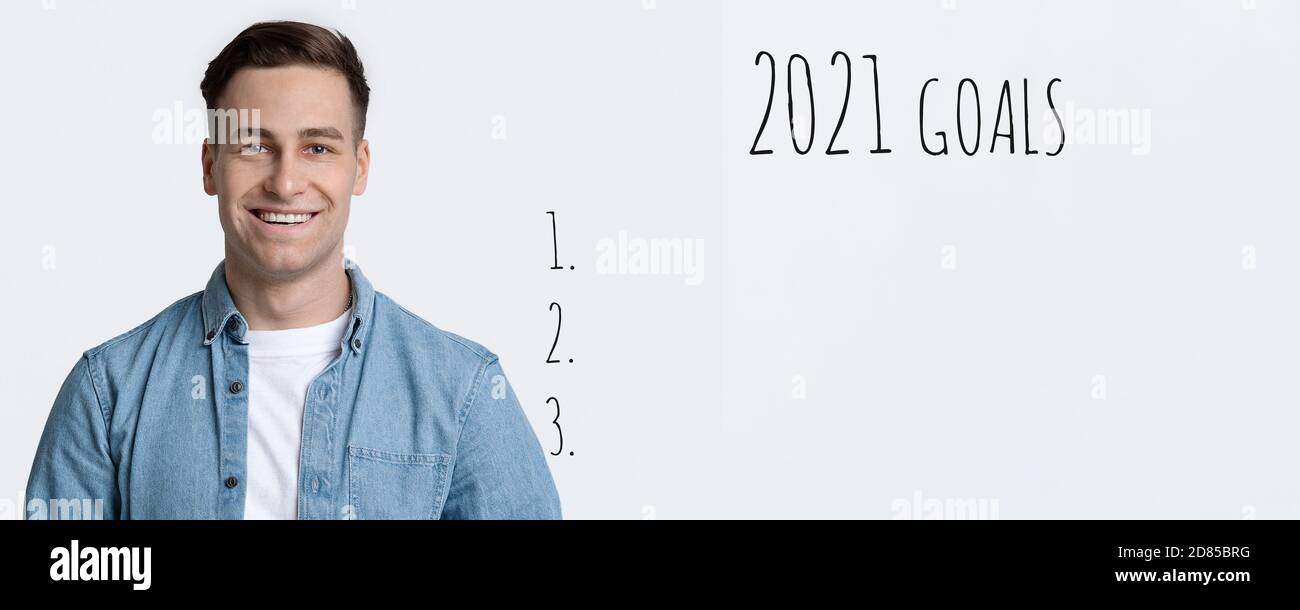 Man Setting Goals Checklist For 2021 Year Posing On White Background ...