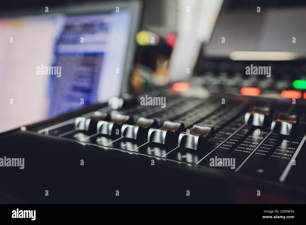 Part of an audio sound mixer with buttons Stock Photo - Alamy