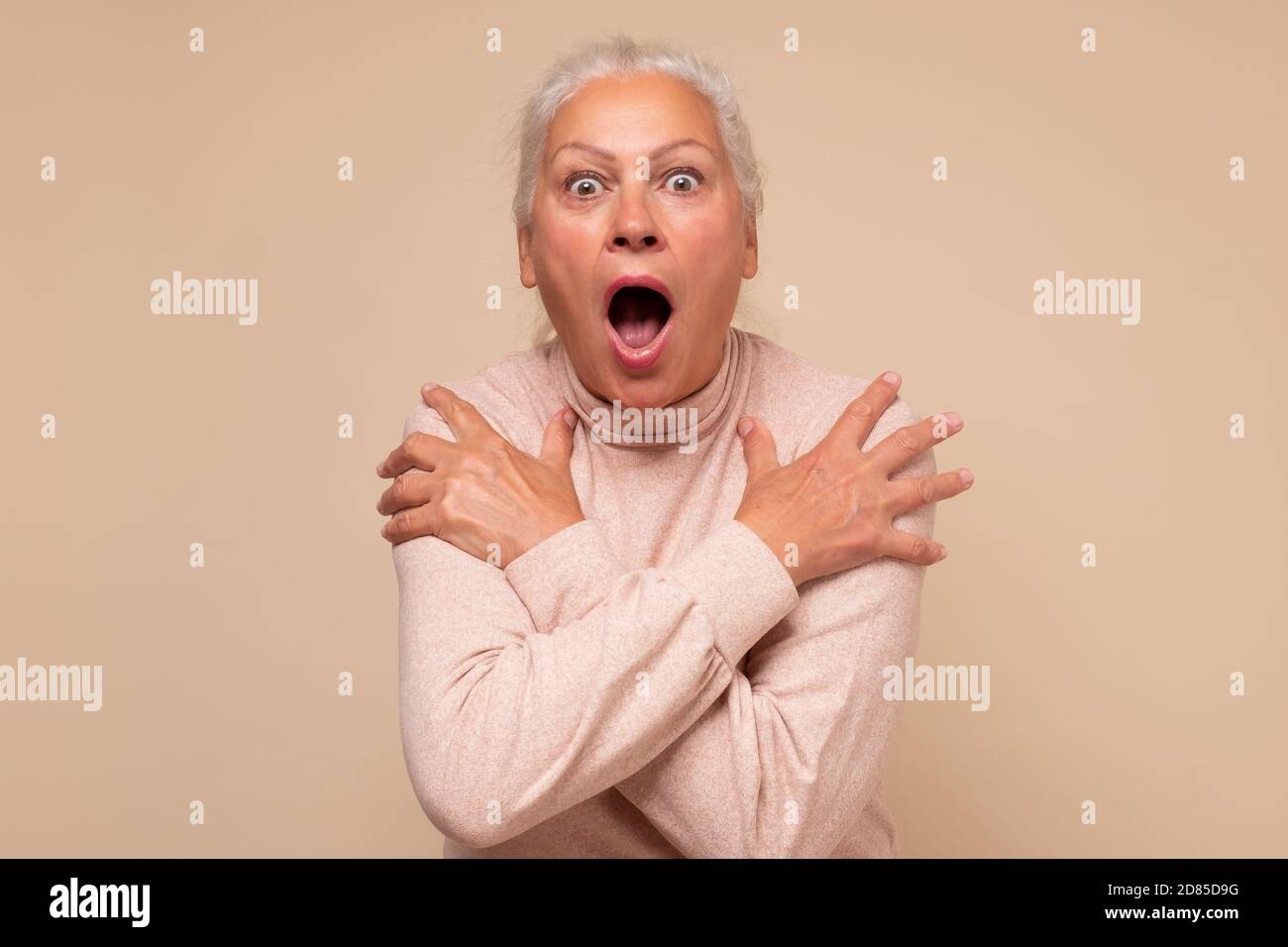 Horrified elderly woman hi-res stock photography and images - Alamy