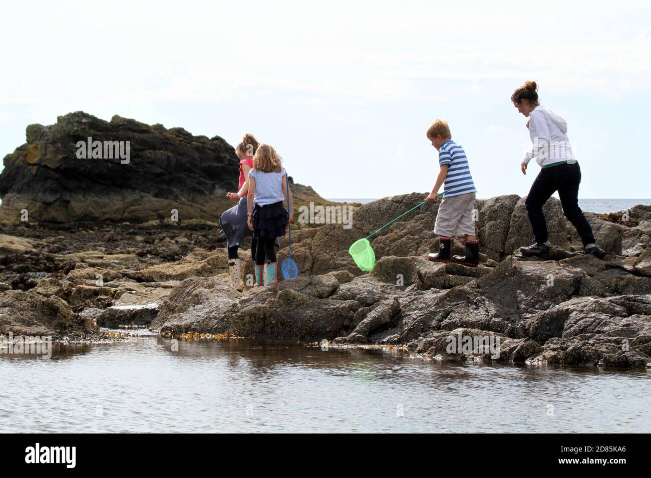 Dunure, Ayrshire, Scotland, UK, GB. A family with children enjoying ...
