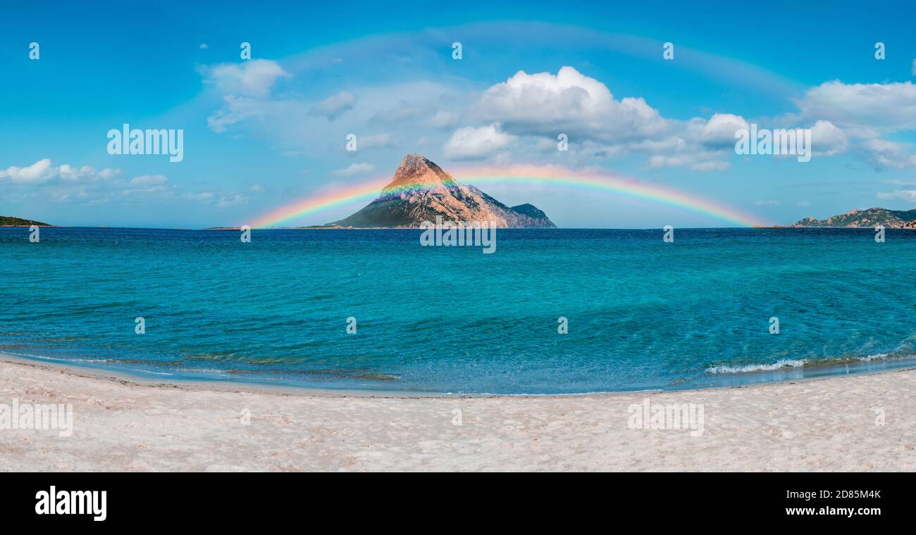 Tavolara island rainbow in Sardinia Italy Stock Photo - Alamy