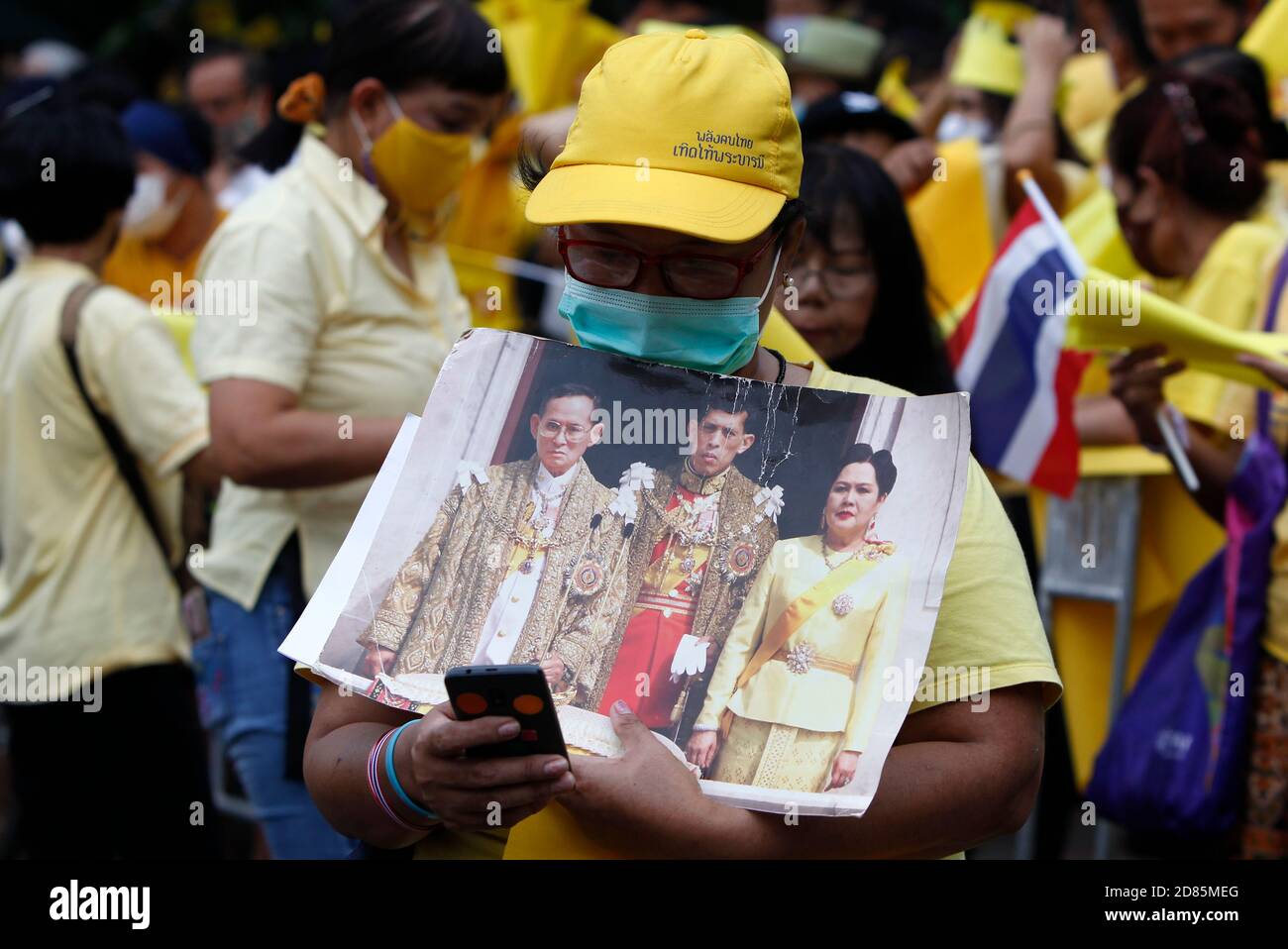 Bangkok, Thailand. 27th Oct, 2020. A pro-royalist holding portraits at ...