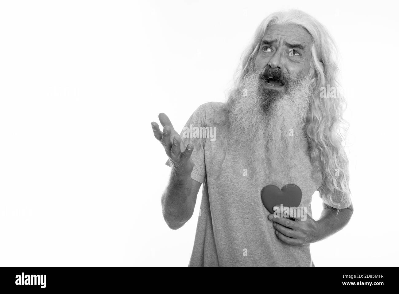 Angry man holding blank Black and White Stock Photos & Images - Alamy