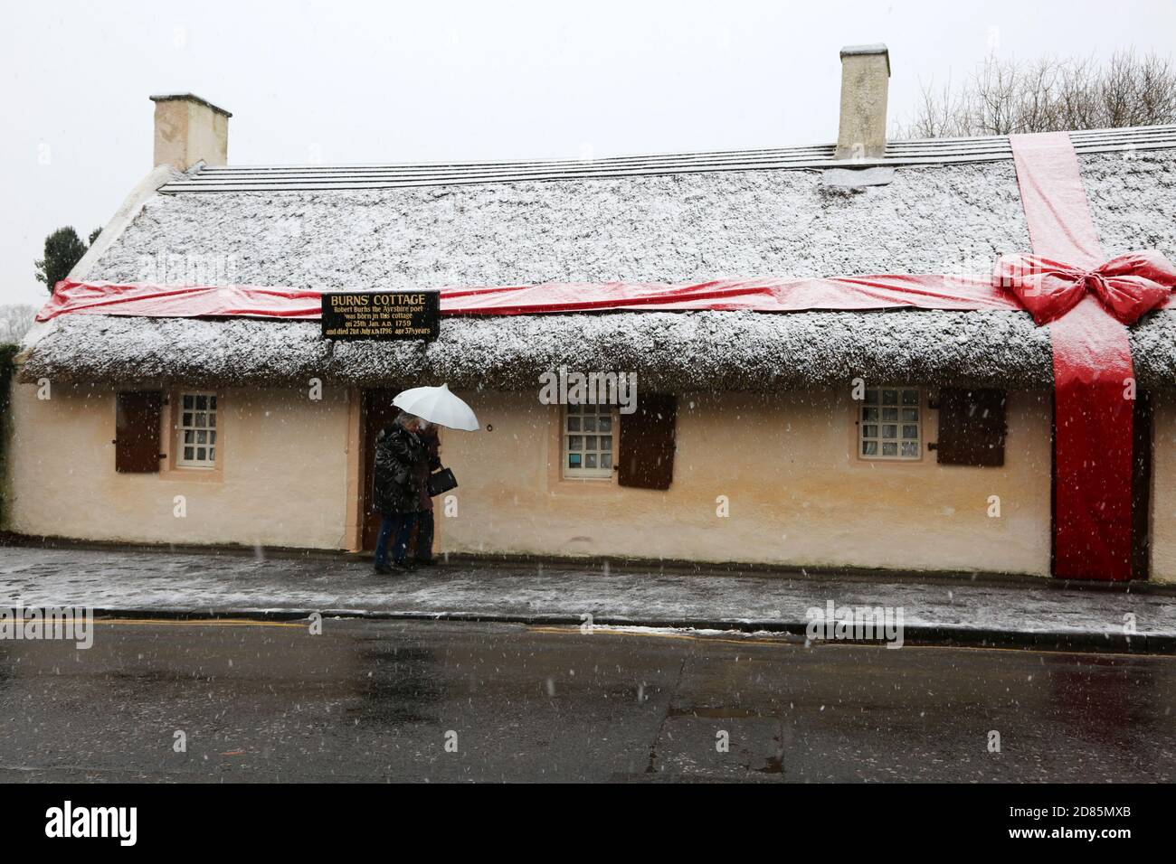 Burns Cottage, Alloway. Ayrshire, Scotland, UK The cottage with a lagre ...