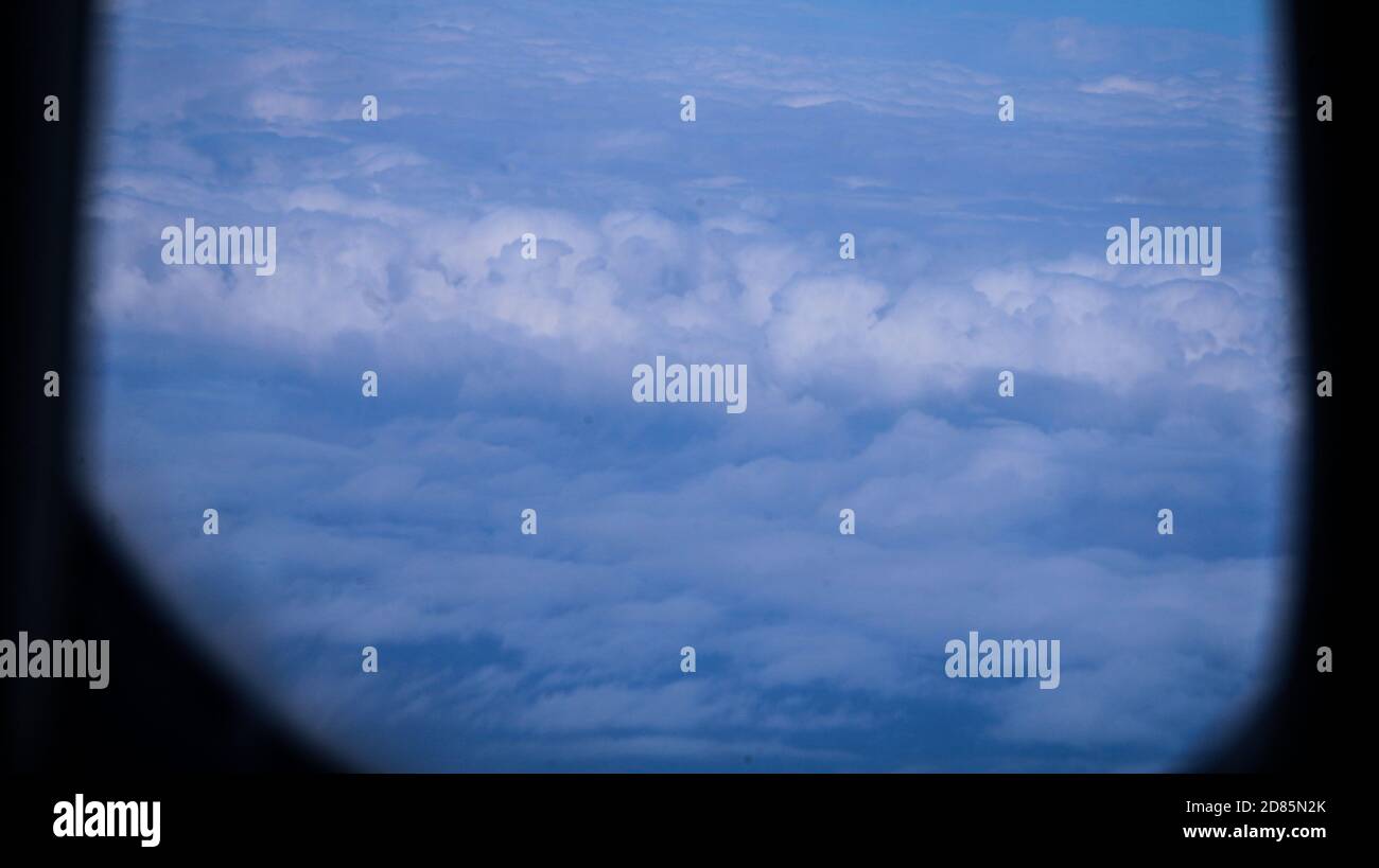 view from the window of an airplane flying Stock Photo - Alamy