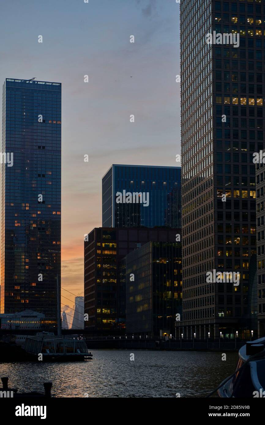 Office buildings and residential towers at dusk, Canary Wharf, Docklands, East end of London, UK ...