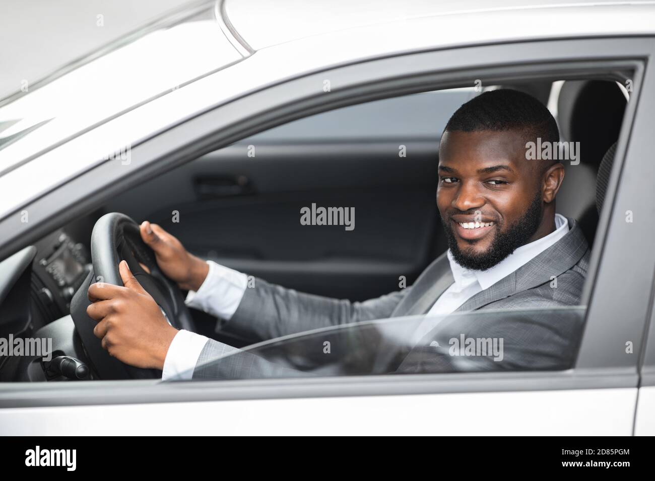Man Driving Car Side View
