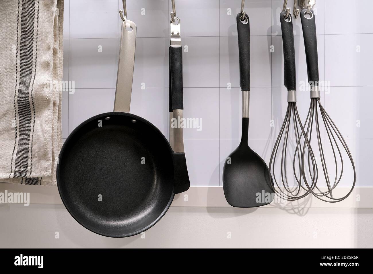 Kitchen utensils for cooking in a modern style on a white background ...