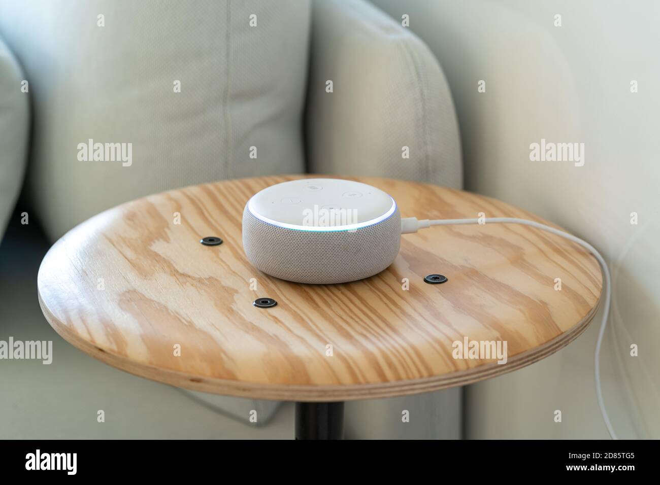 VIENNA,AUSTRIA - October 26 : A white Amazon Alexa Echo on a small ...