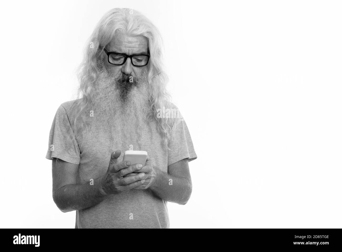 Elderly using phone Cut Out Stock Images & Pictures - Alamy