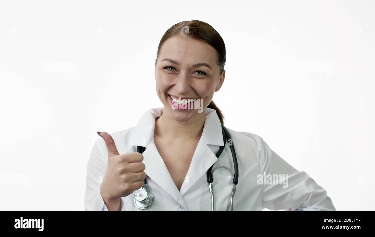 Happy attractive doctor having laughing showing like sign on white ...
