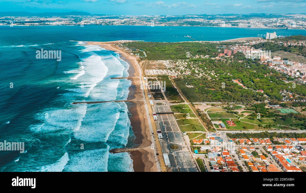 The Aerial footage of Costa da Caparica coastline of glorious sandy ...