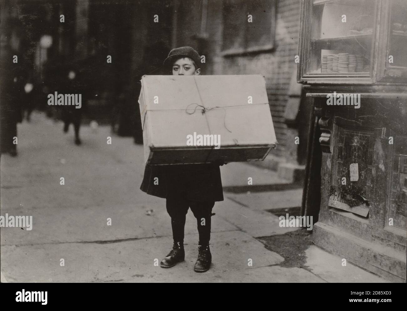 Vintage photo Lewis W. Hine - Boy with a big package. New York City ...